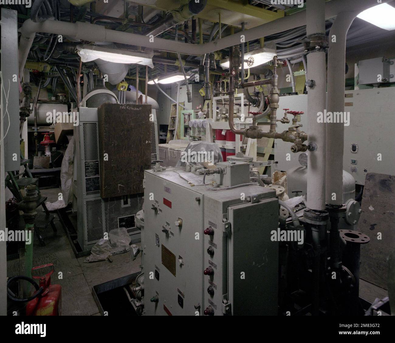 A view of auxiliary machinery room No. 3 aboard the guided missile ...