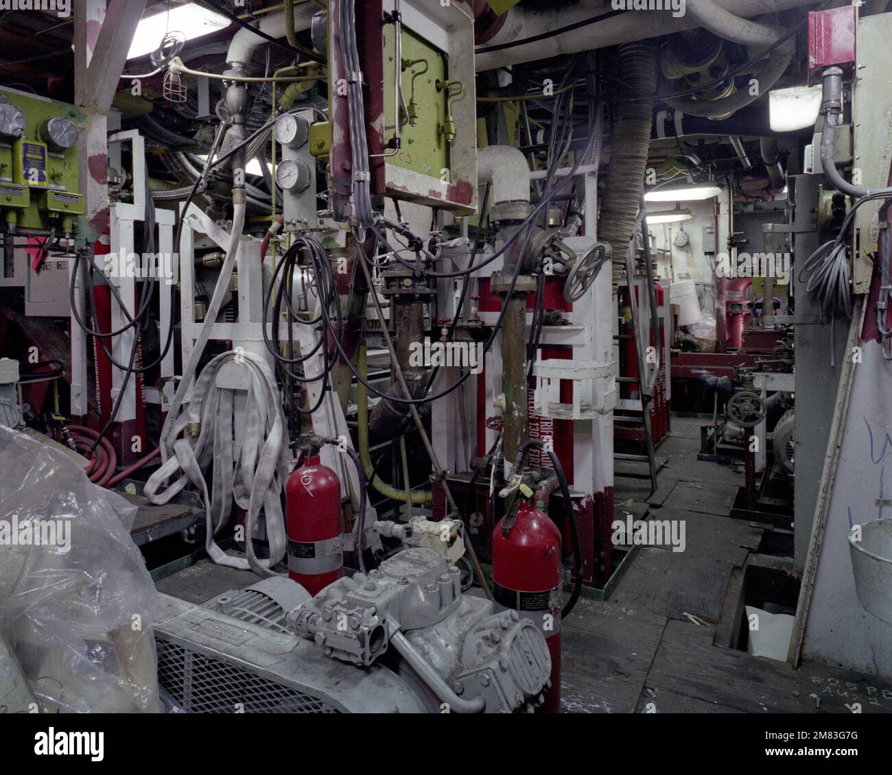 A view of auxiliary machinery room No. 1 aboard the guided missile ...