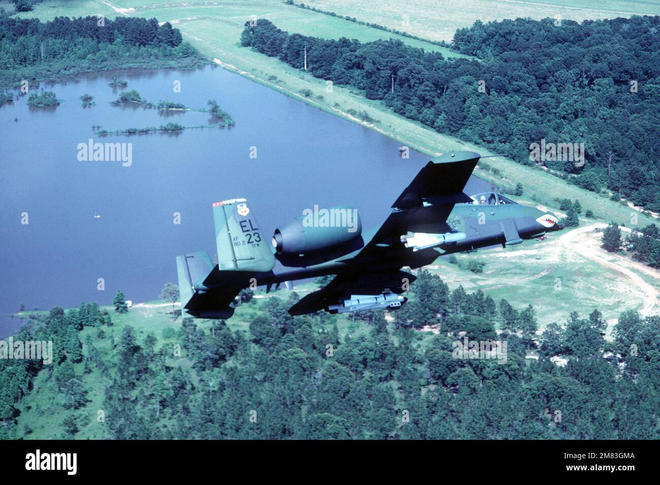 An air-to-air right side view of a 23rd Tactical Fighter Wing A-10 ...