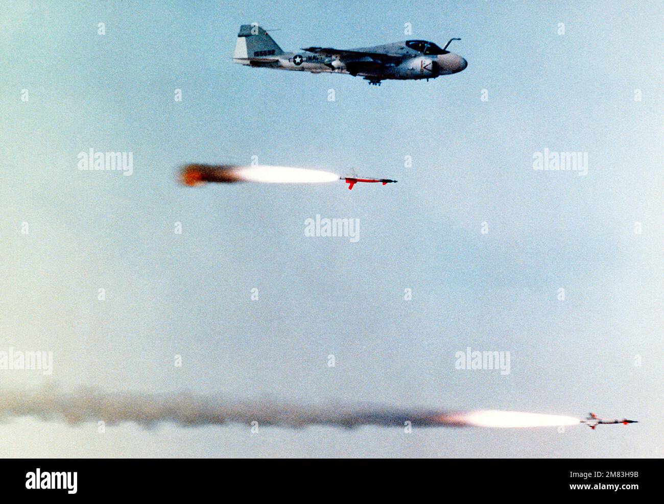 An air-to-air right side view of an A-6 Intruder aircraft as its crew ...