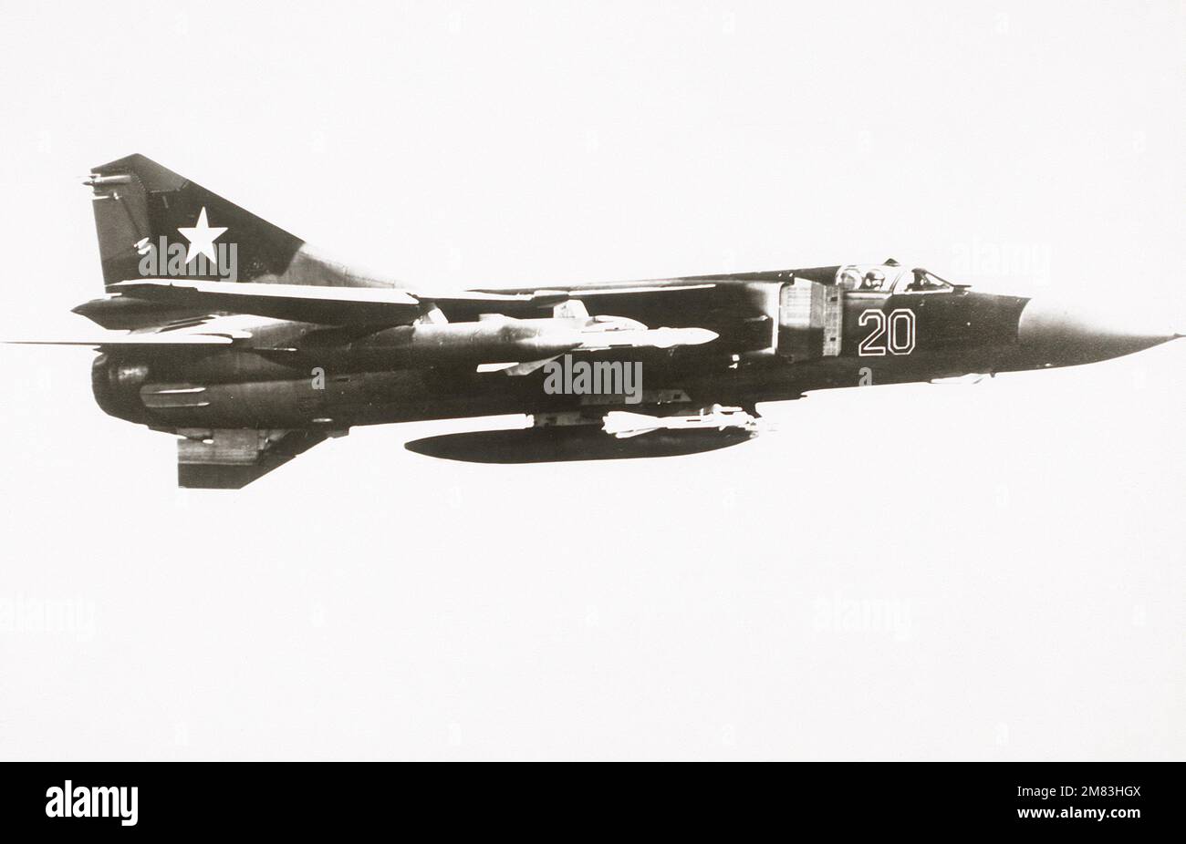 An air-to-air right side view of a Soviet MiG-23 Flogger-G aircraft ...