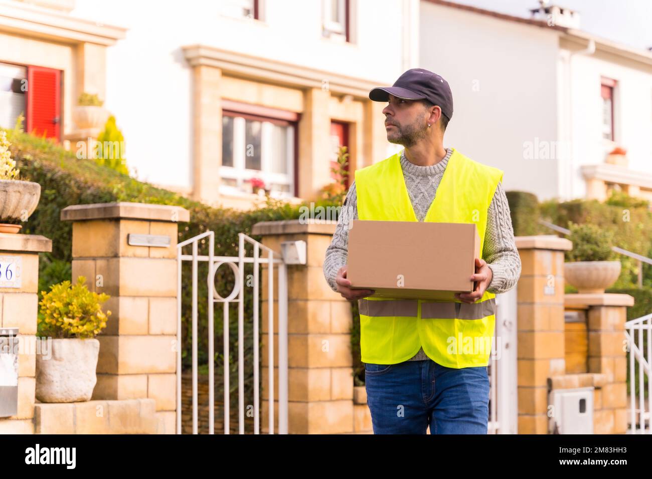 Guy from delivery service in hi-res stock photography and images - Alamy