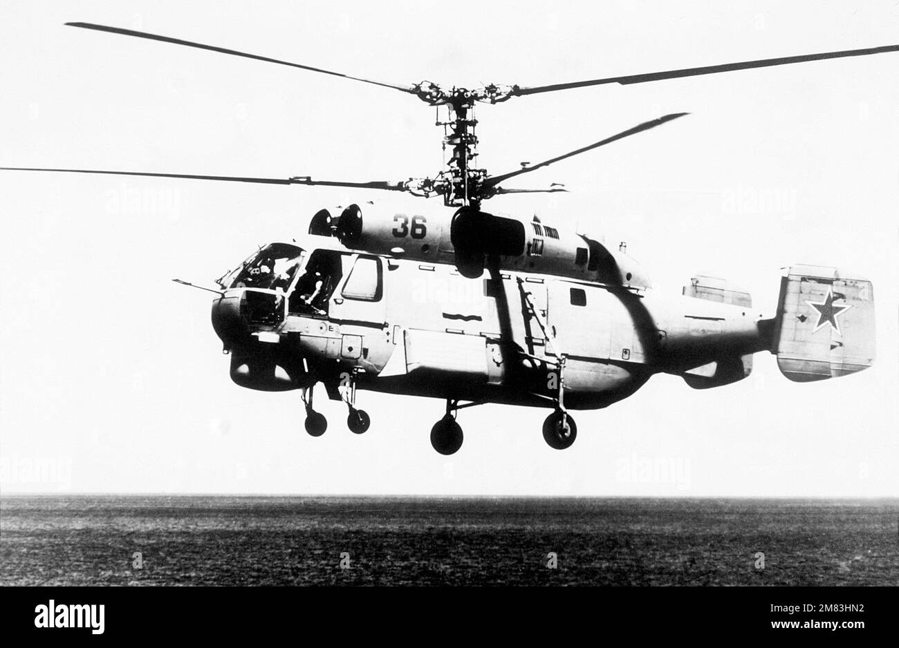 A left side view of a Soviet Ka-32 Helix helicopter in flight. From Soviet Military Power 1985 ...