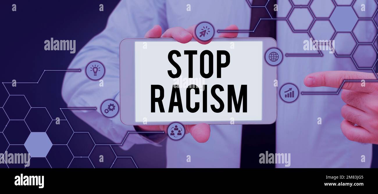 Hand writing sign Stop Racism. Word Written on end the antagonism ...
