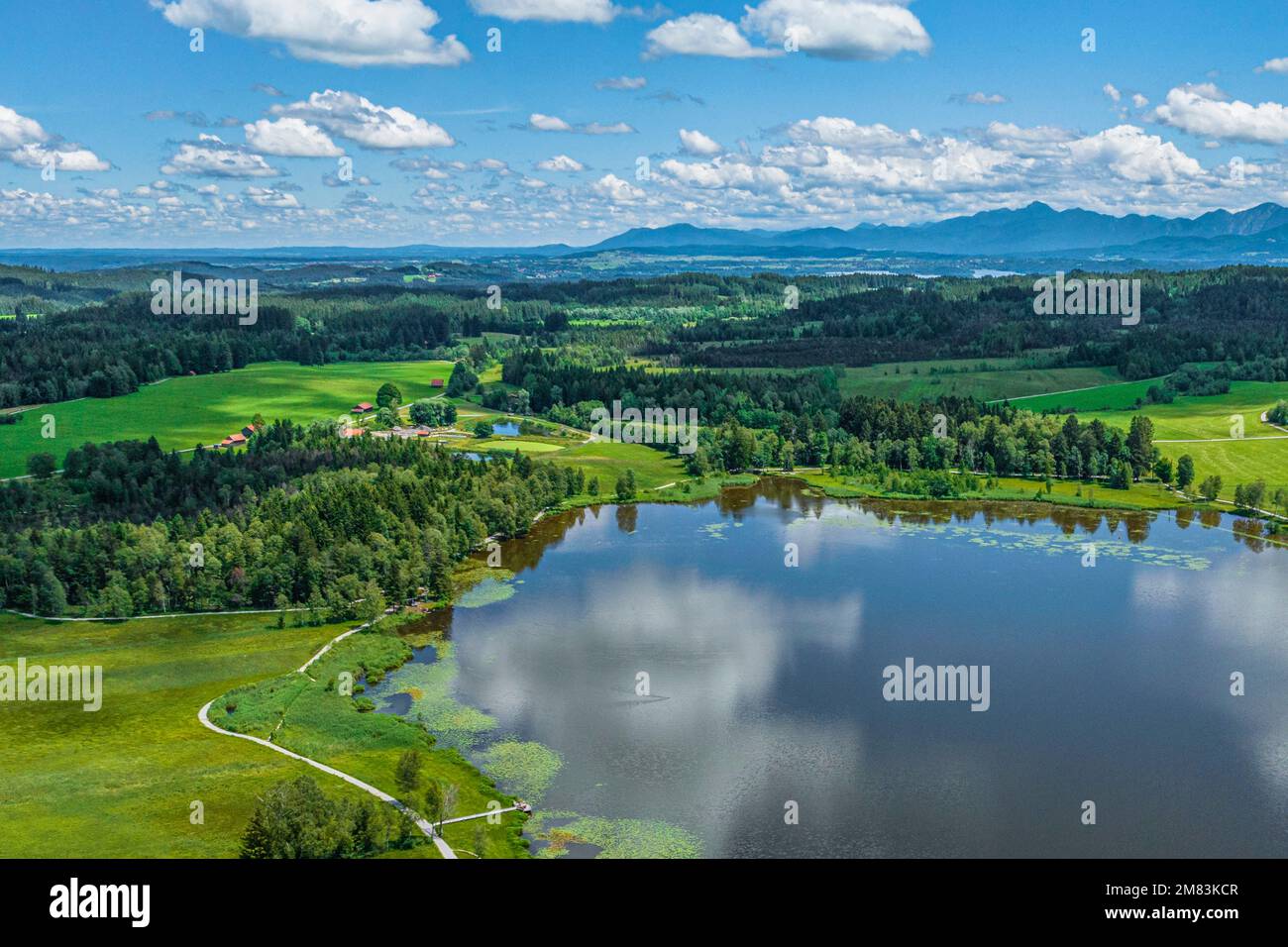 Aerial view to the beautiful upper bavarian village of Bayersoien and ...