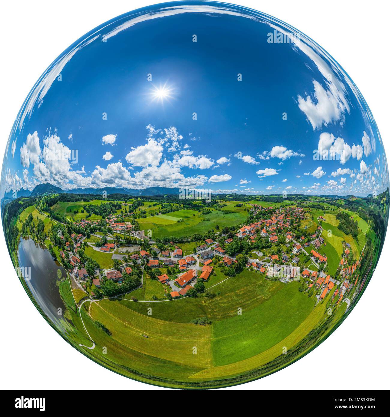 Aerial view to the beautiful upper bavarian village of Bayersoien and ...