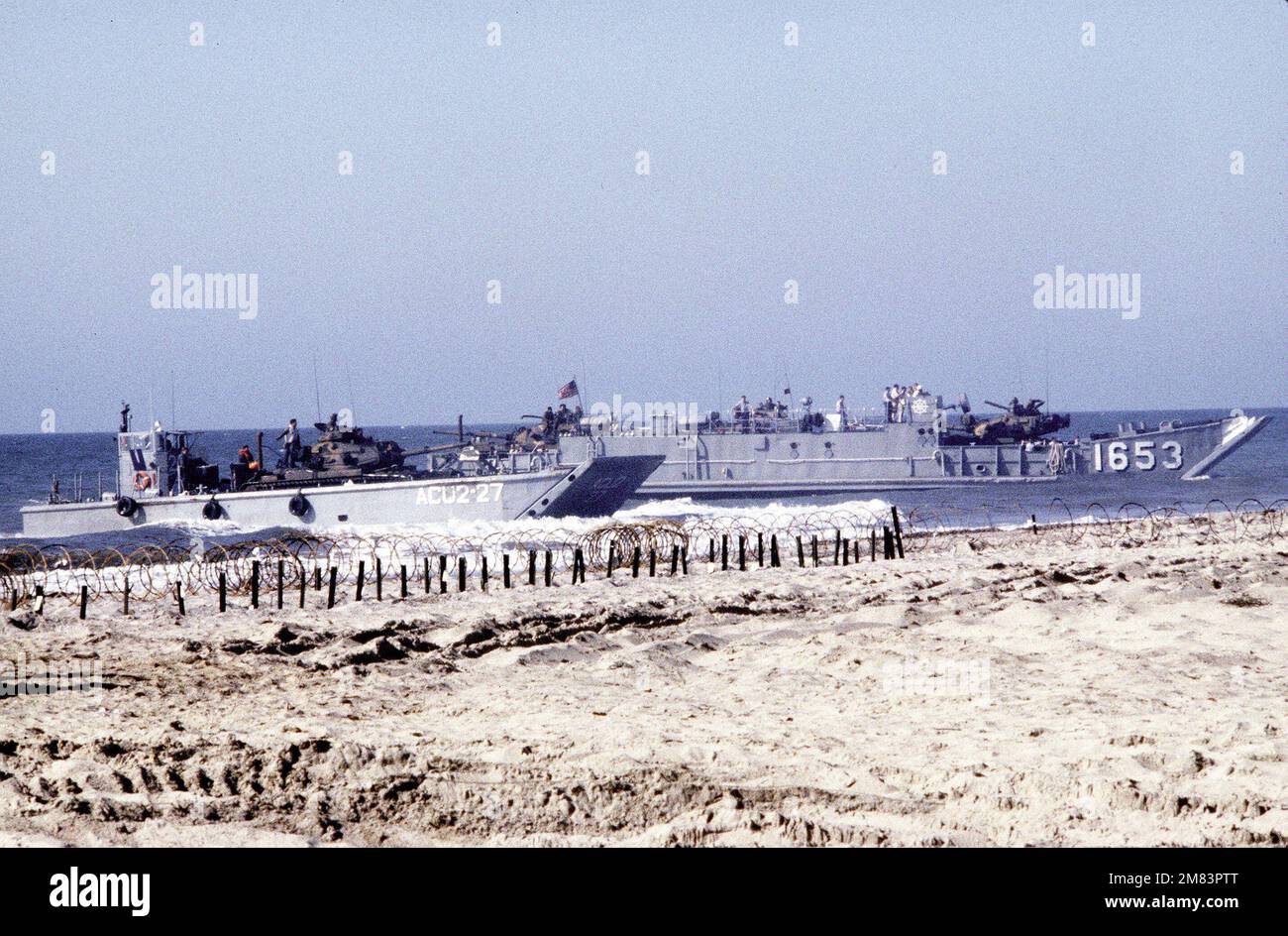 An LCM-8 Mod-1 mechanized landing craft of Assault Craft Unit 2 (ACU-2 ...