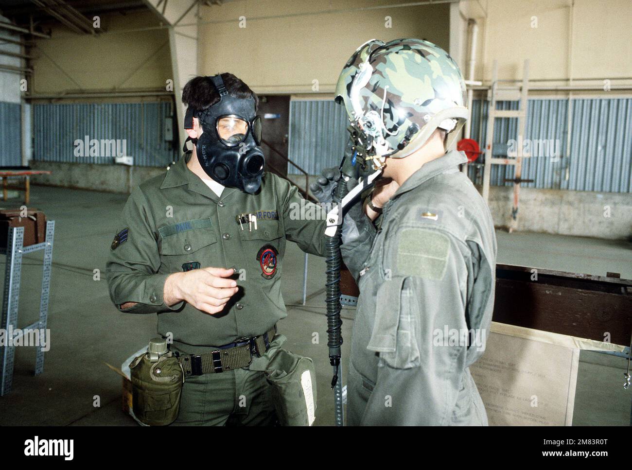 A member of the 23rd Tactical Air Support Squadron wears an M-17 ...