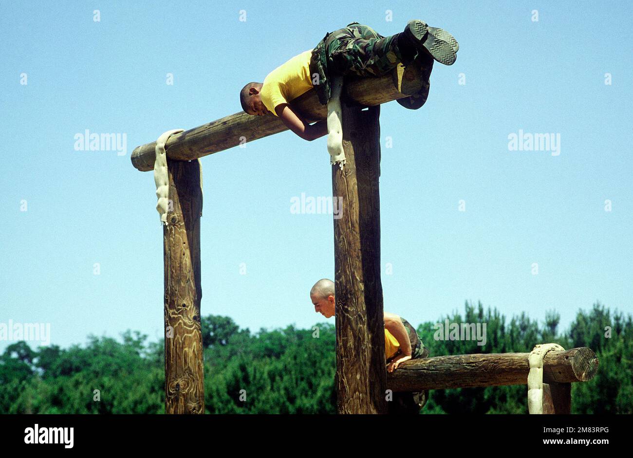 Marine recruits run the obstacle course during basic training at the ...