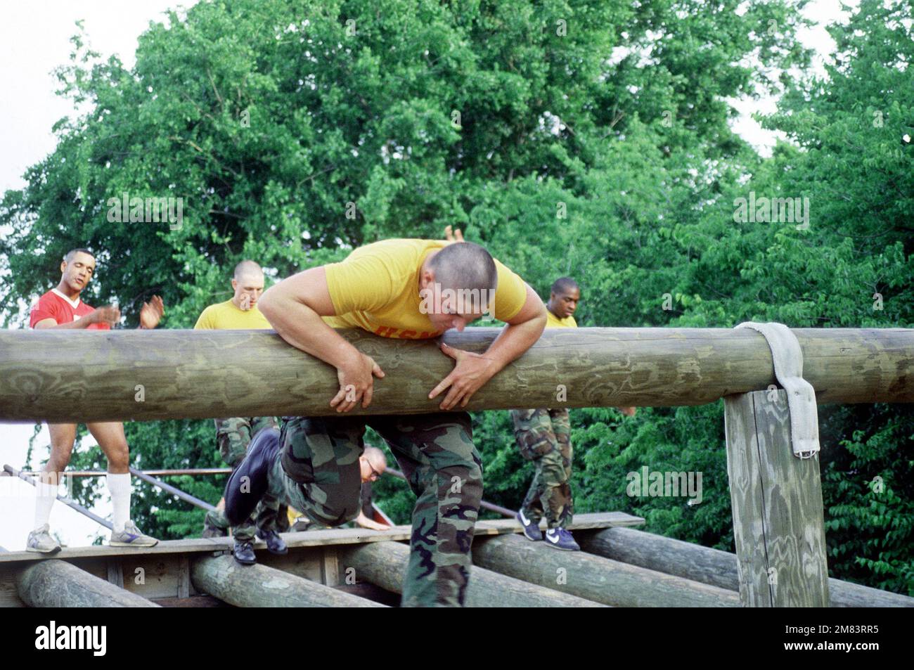Marine recruits run the obstacle course during basic training at the ...
