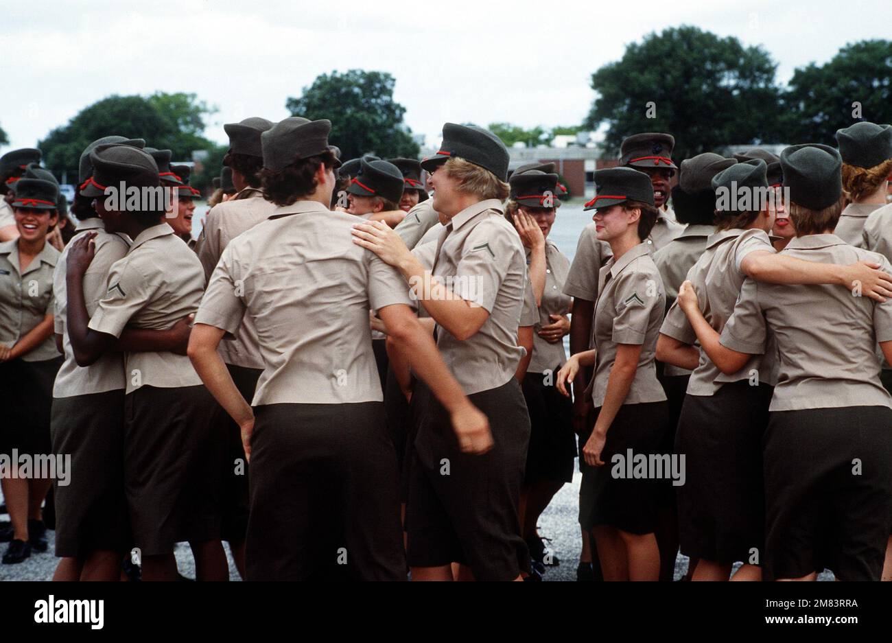 Women Marines celebrate after graduating from basic training at the ...