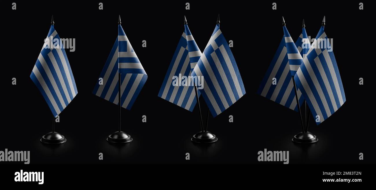 Small national flags of the Greece on a black background Stock Photo ...