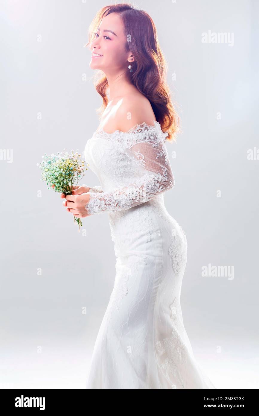 Happy and sweet bride and groom Stock Photo - Alamy