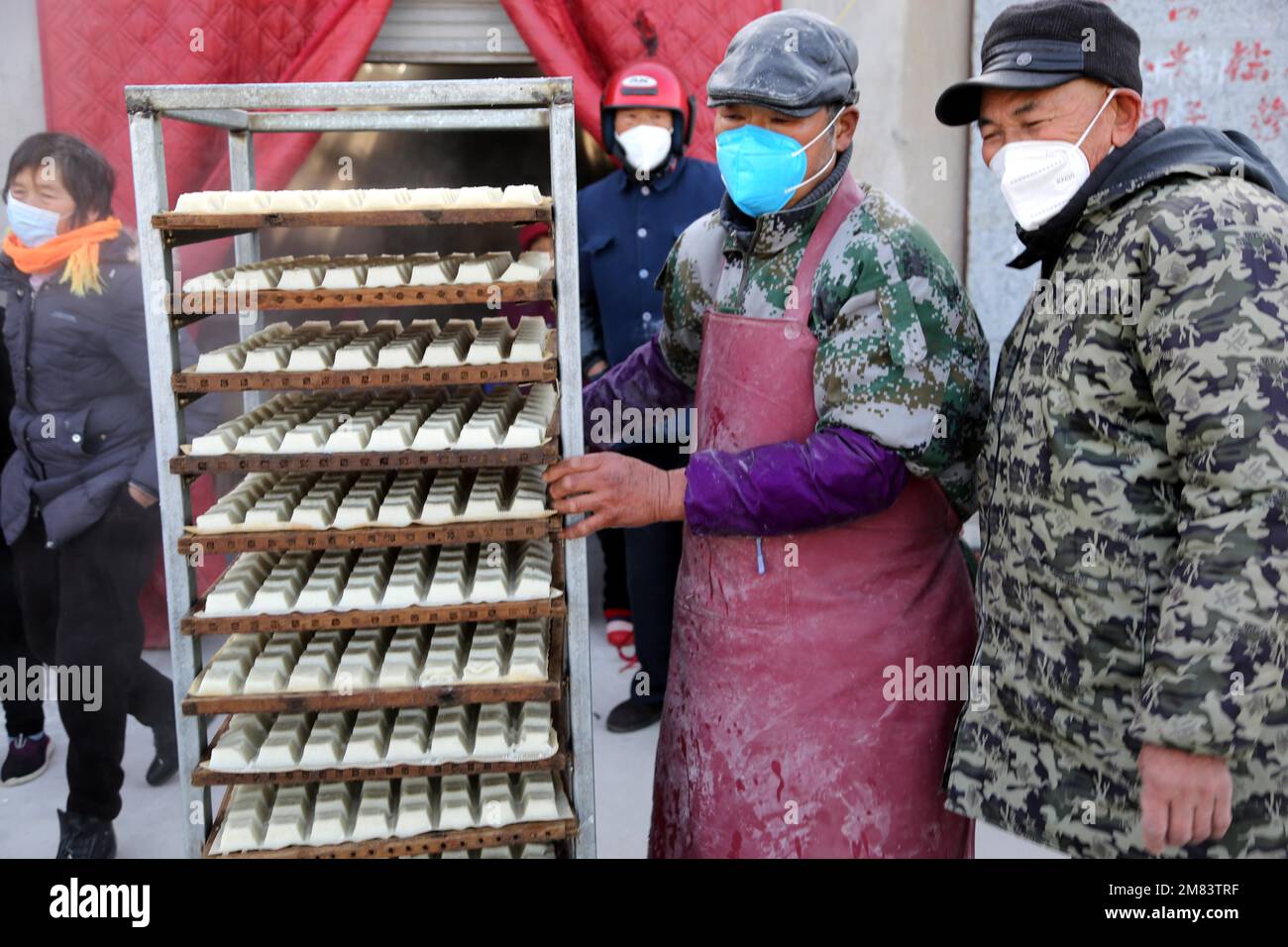 People make Nian gao, or rice cakes to welcome the coming of the Spring ...