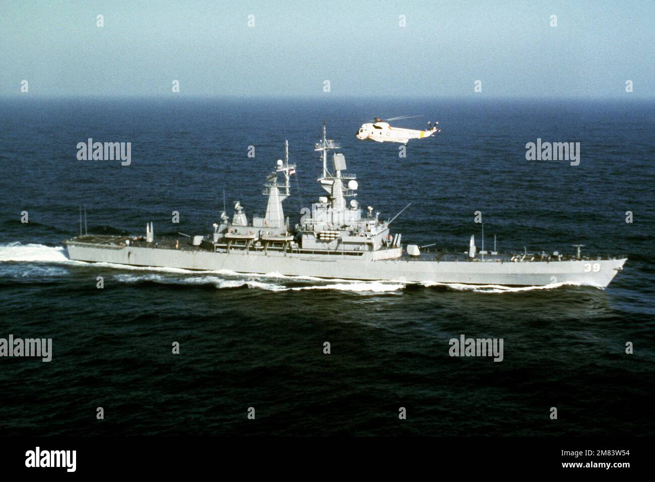 An elevated starboard bow view of the nuclear-powered guided missile ...