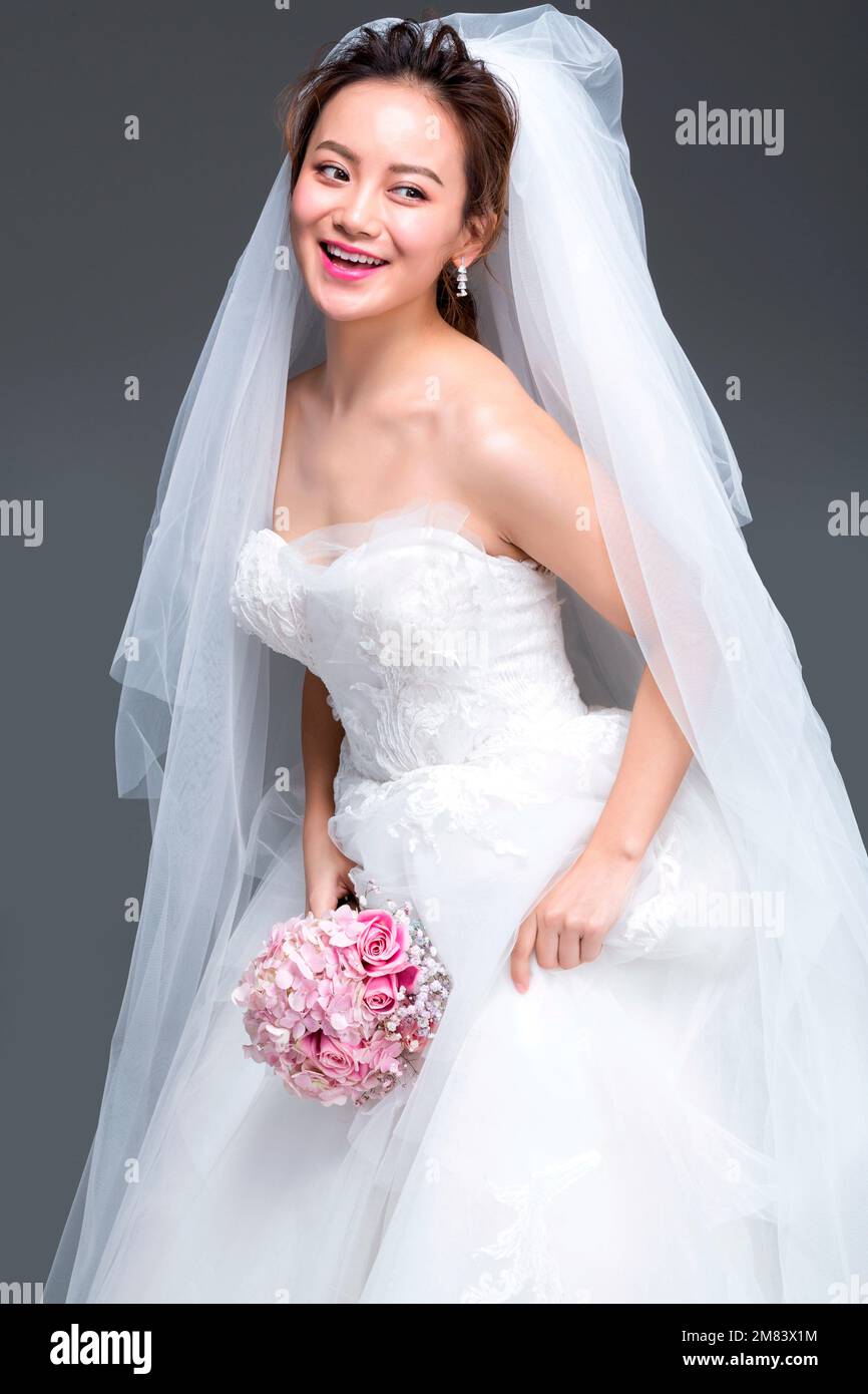 Happy and sweet bride and groom Stock Photo - Alamy