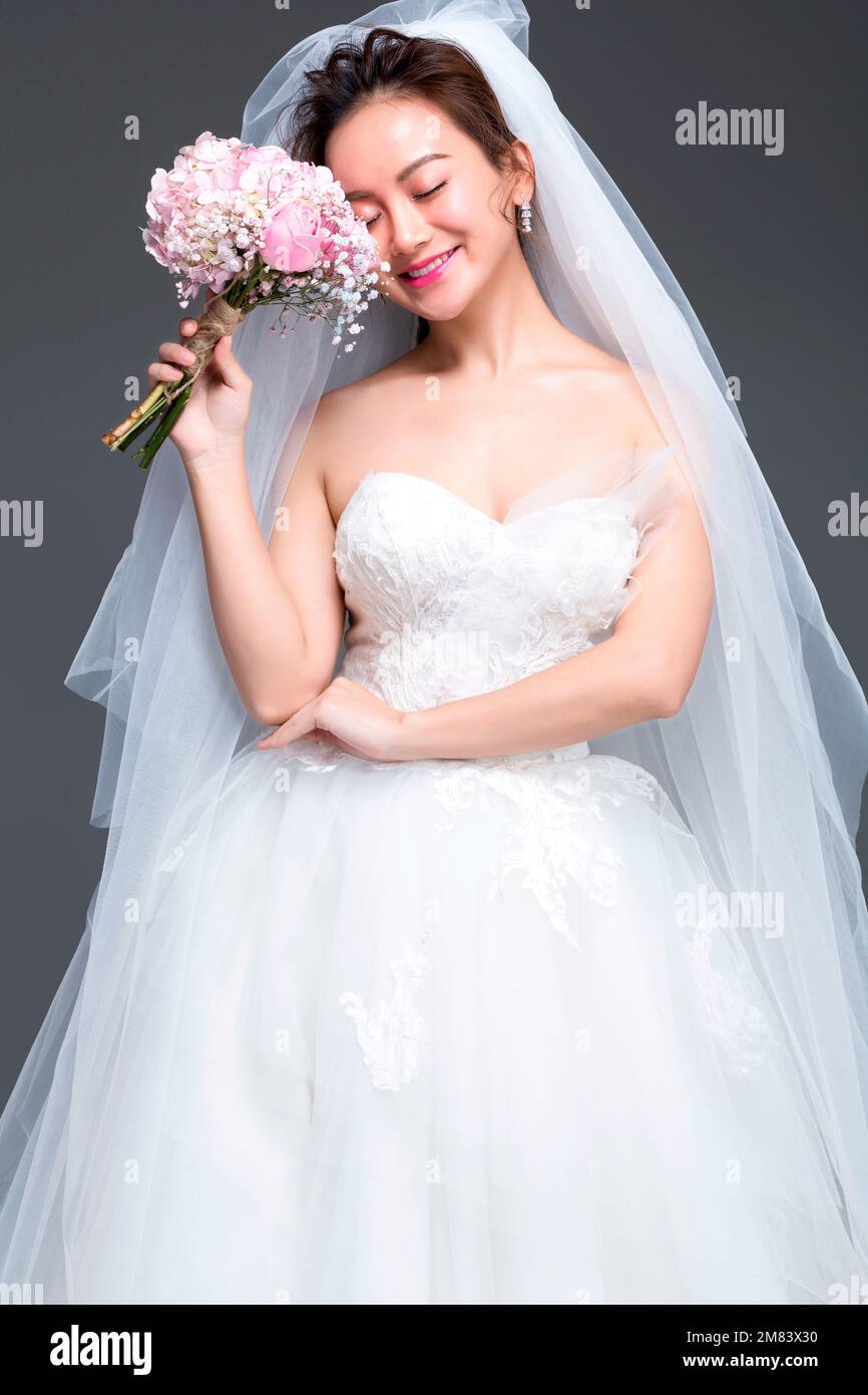 Happy and sweet bride and groom Stock Photo - Alamy