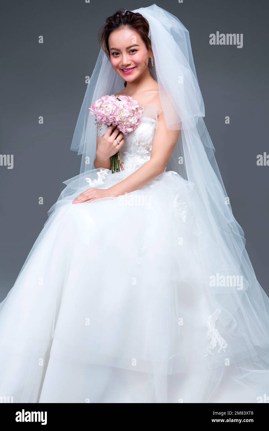 Happy and sweet bride and groom Stock Photo - Alamy