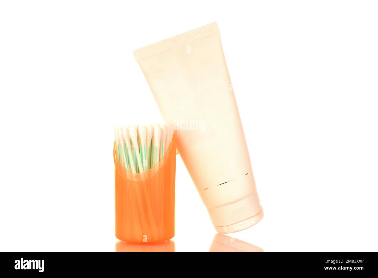 One plastic container for cosmetics and ear sticks in plastic container ...