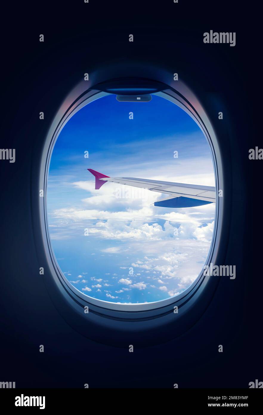 Clouds sky, looking through the window of an airplane Stock Photo - Alamy