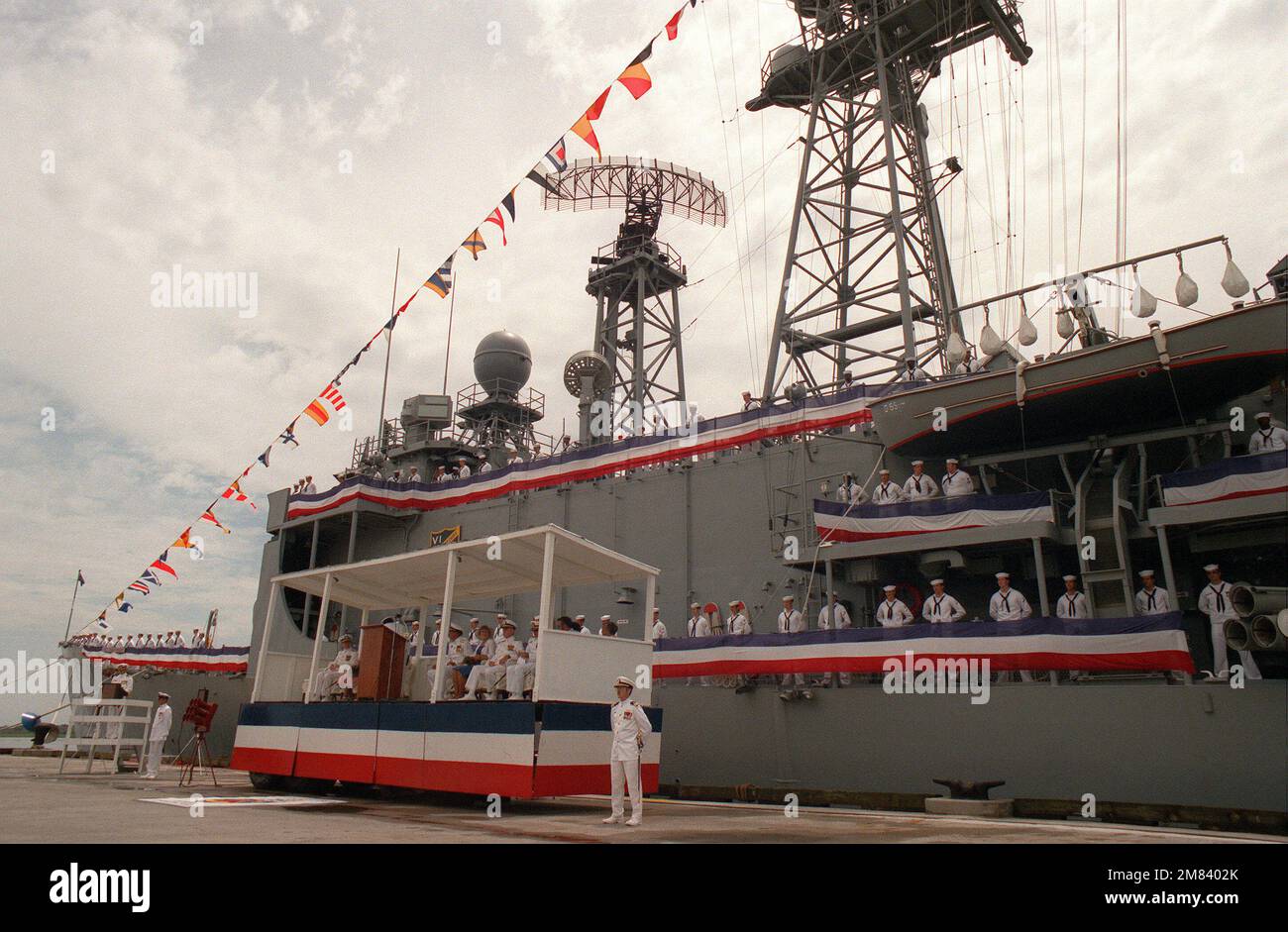 The crew of the guided missile frigate USS ELROD (FFG 55) mans the ...