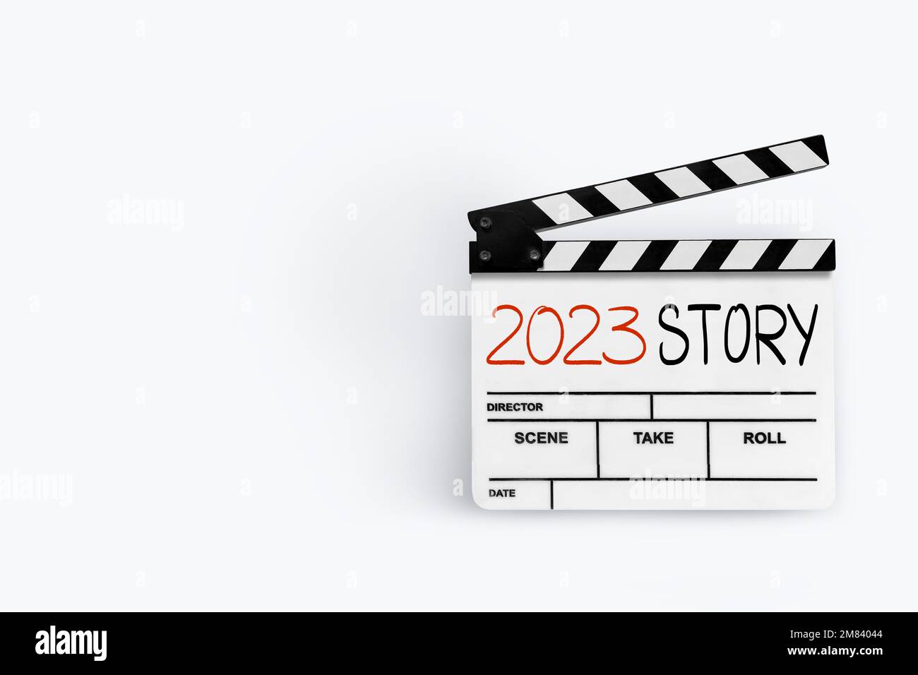 2023 story. handwriting on film slate or movie clapboard.Happy new year ...