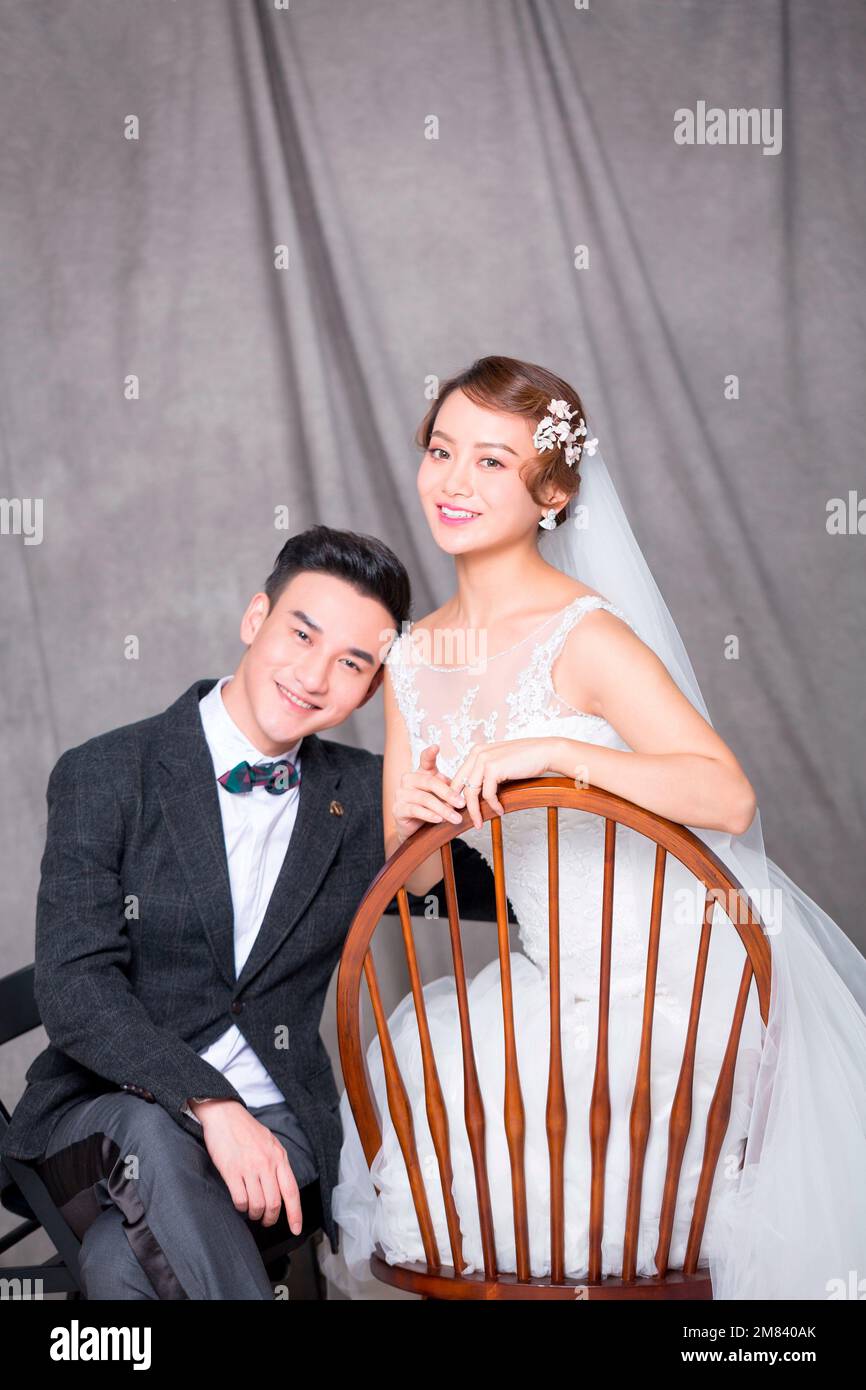 Happy and sweet bride and groom Stock Photo - Alamy