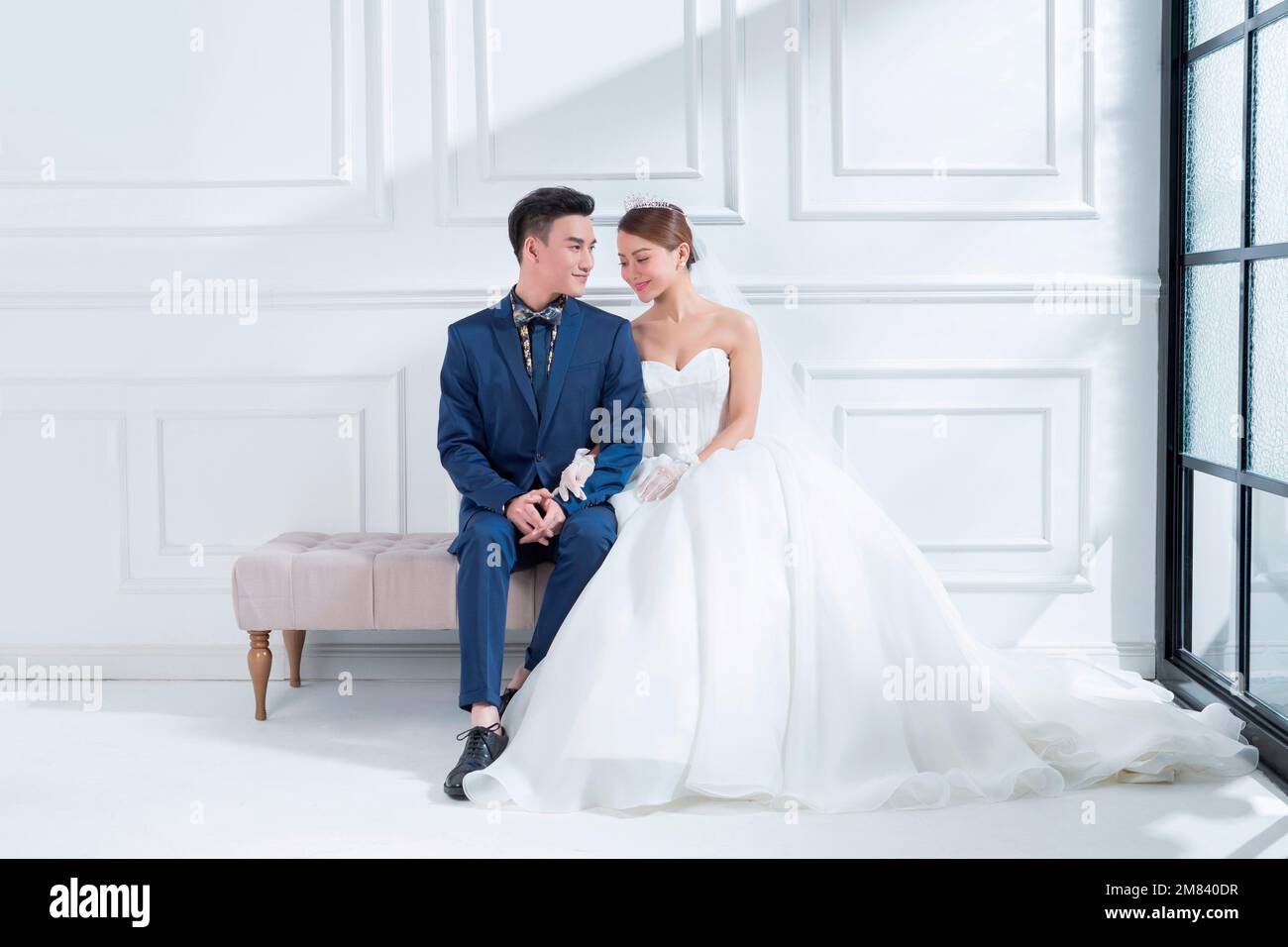 Happy and sweet bride and groom Stock Photo - Alamy