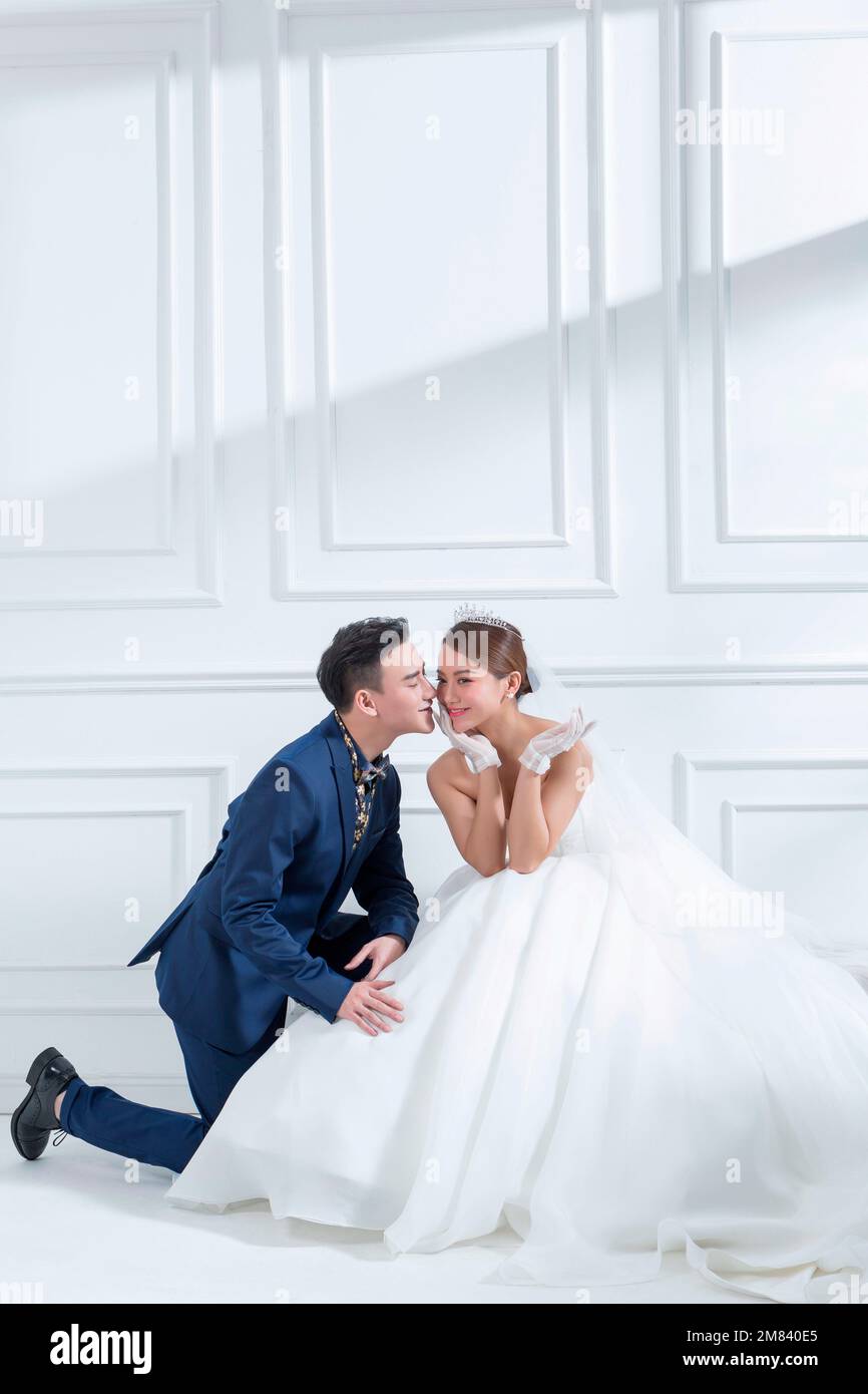 Happy and sweet bride and groom Stock Photo - Alamy