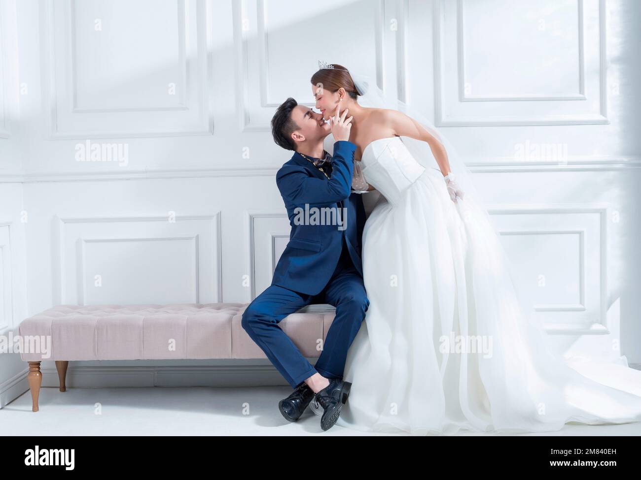 Happy and sweet bride and groom Stock Photo - Alamy