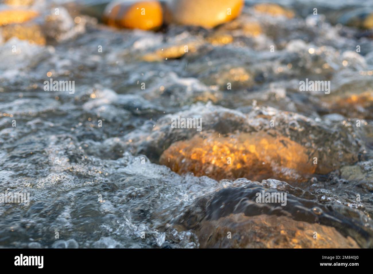 Shallow water over pebbles hi-res stock photography and images - Alamy