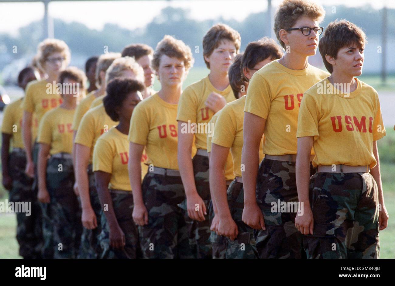Women Marine recruits stand in line waiting to begin the challenge ...