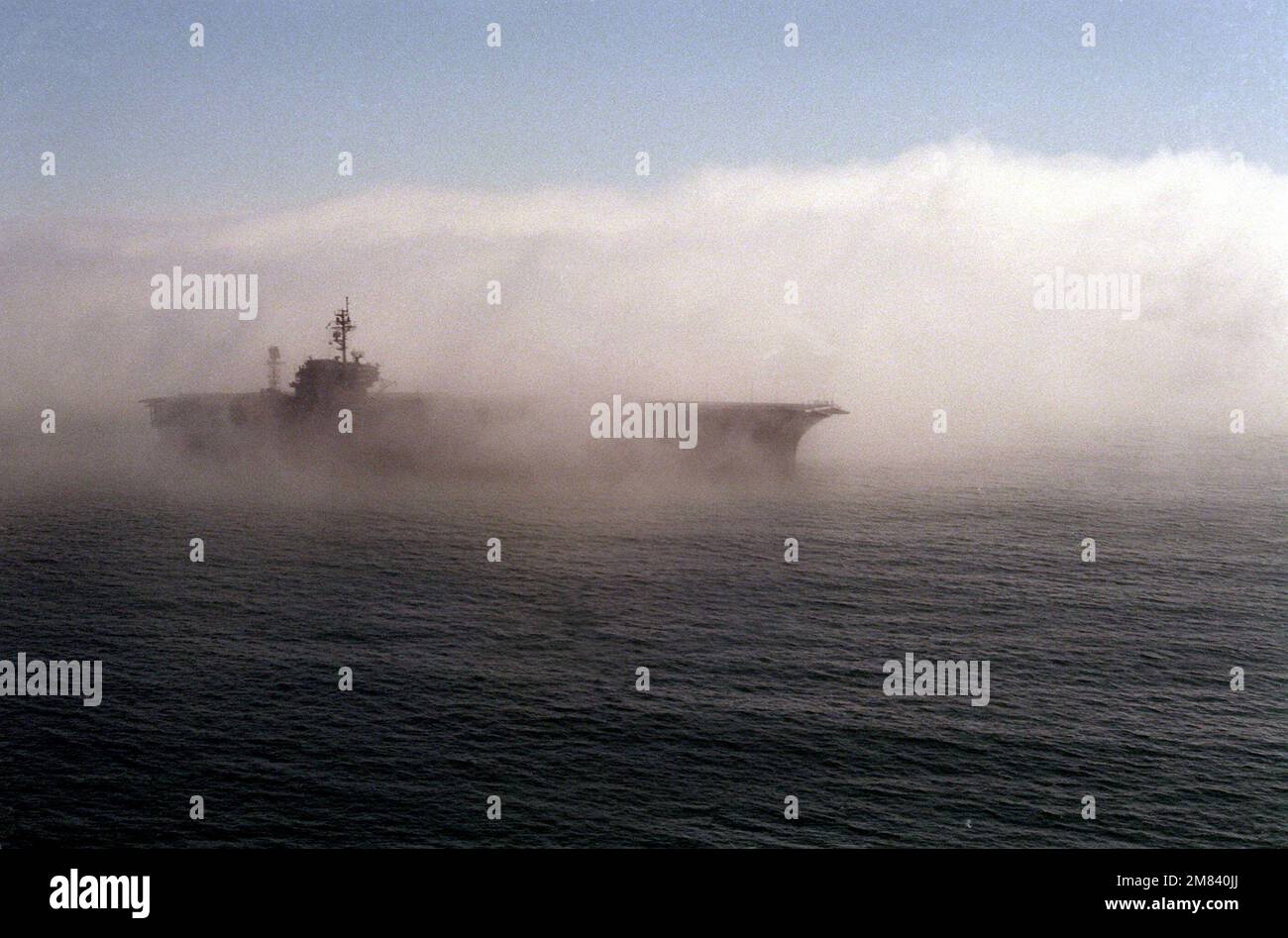 A starboard view of the aircraft carrier USS KITTY HAWK (CV-63 ...