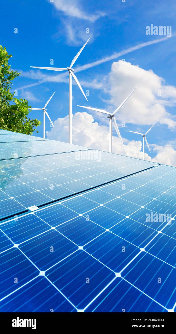 solar panel, and a wind turbine in the blue sky. Clean energy ...