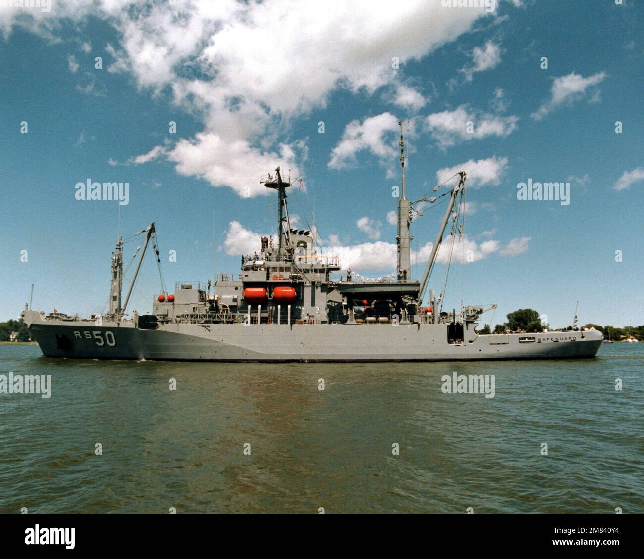 A port beam view of the salvage ship SAFEGUARD (ARS 50) undergoing ...