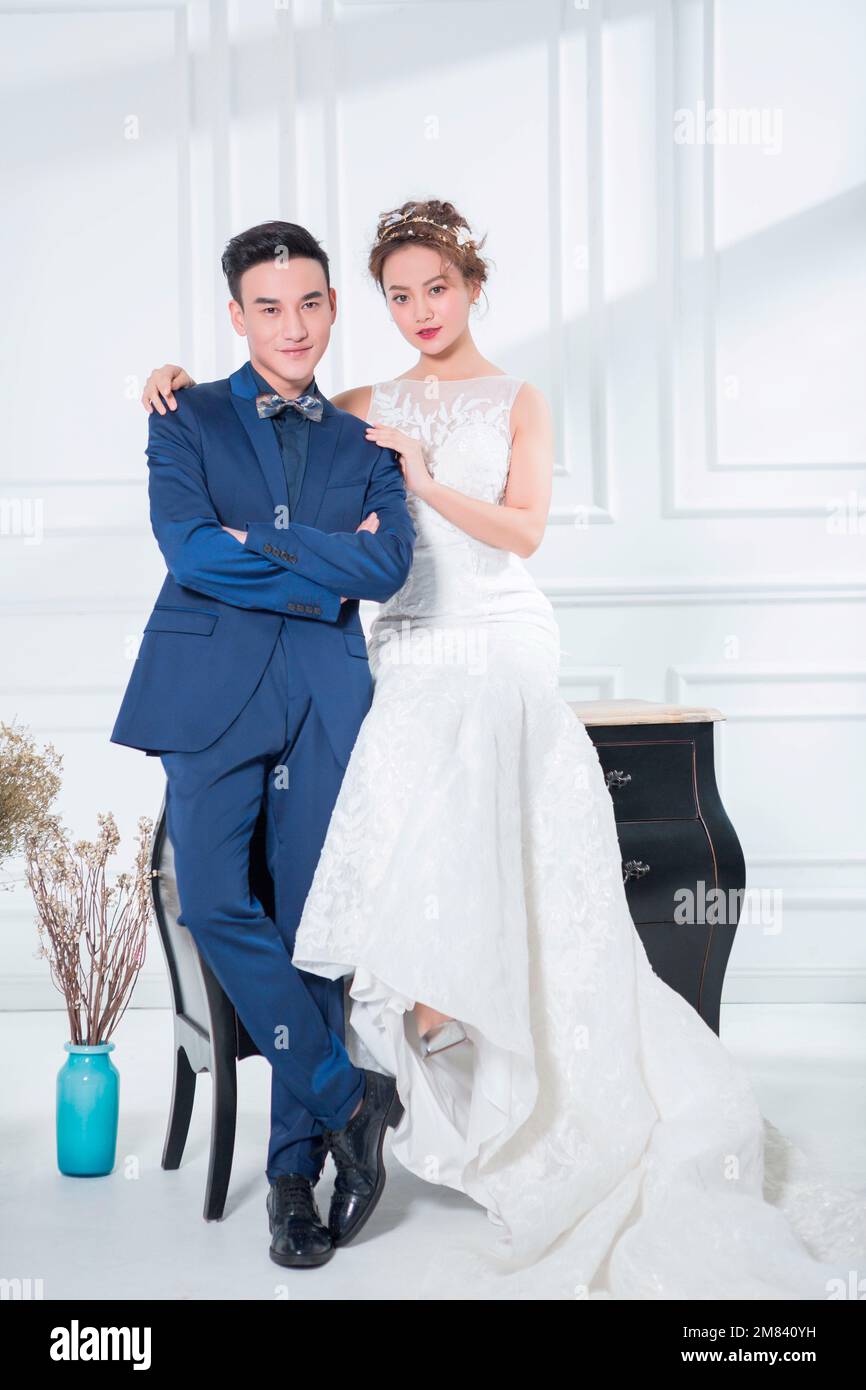 Happy and sweet bride and groom Stock Photo - Alamy