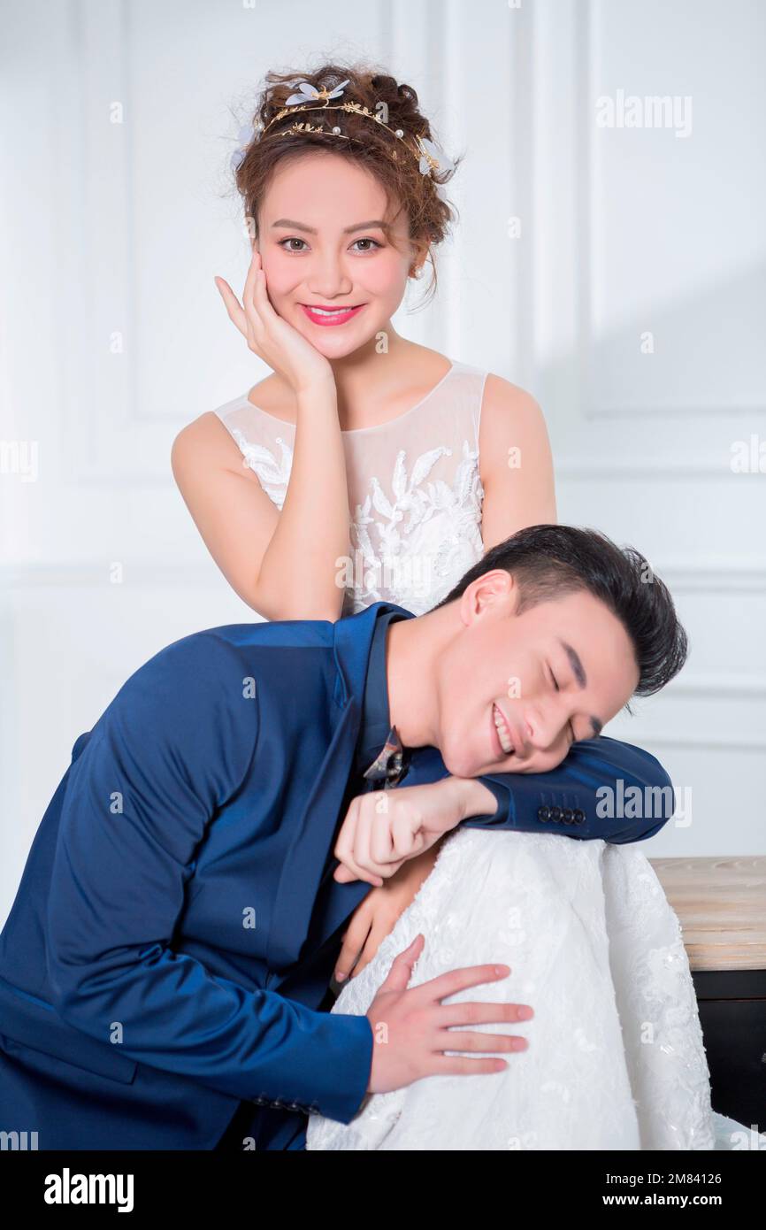 Happy and sweet bride and groom Stock Photo - Alamy