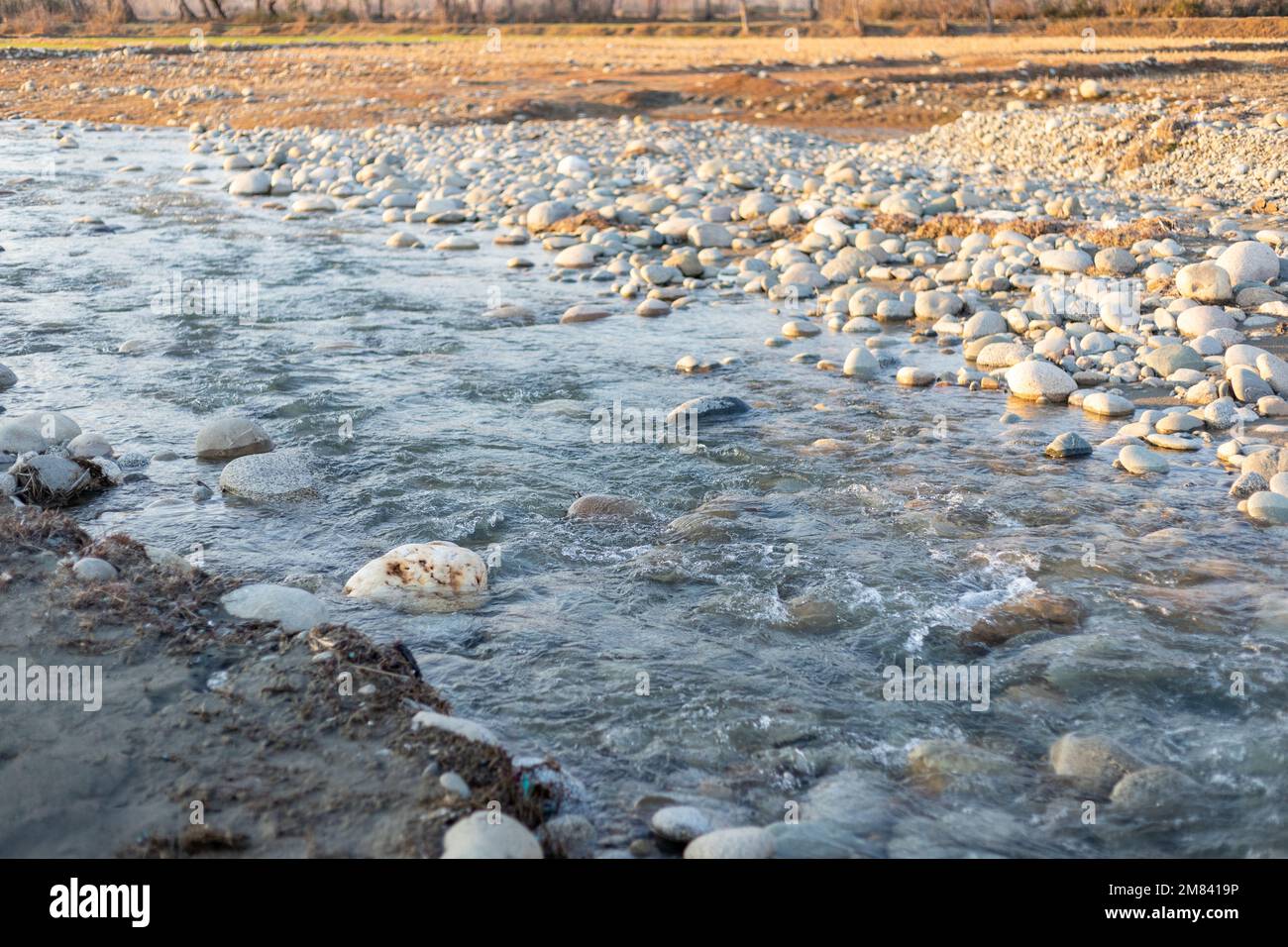 Stream flowing sea sunset hi-res stock photography and images - Alamy