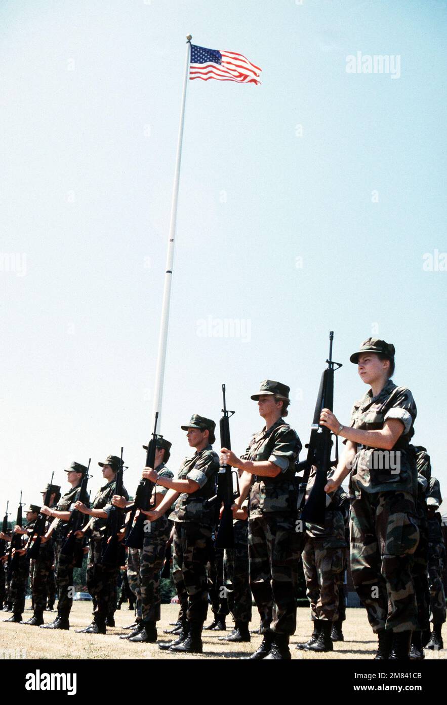The Marine Corps first all-woman drill platoon stands in formation with ...