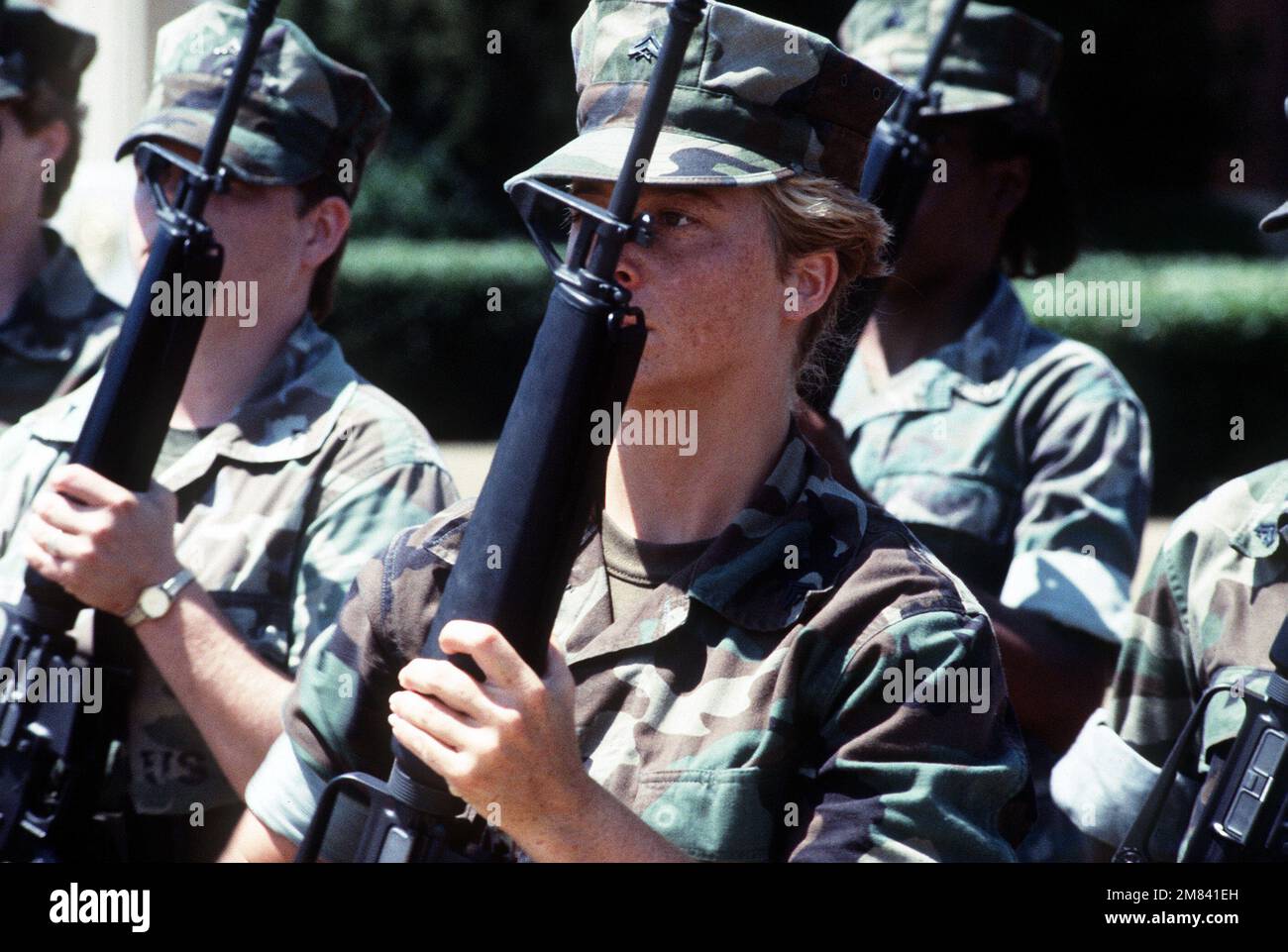 The Marine Corps first all-woman drill platoon stands in formation with ...