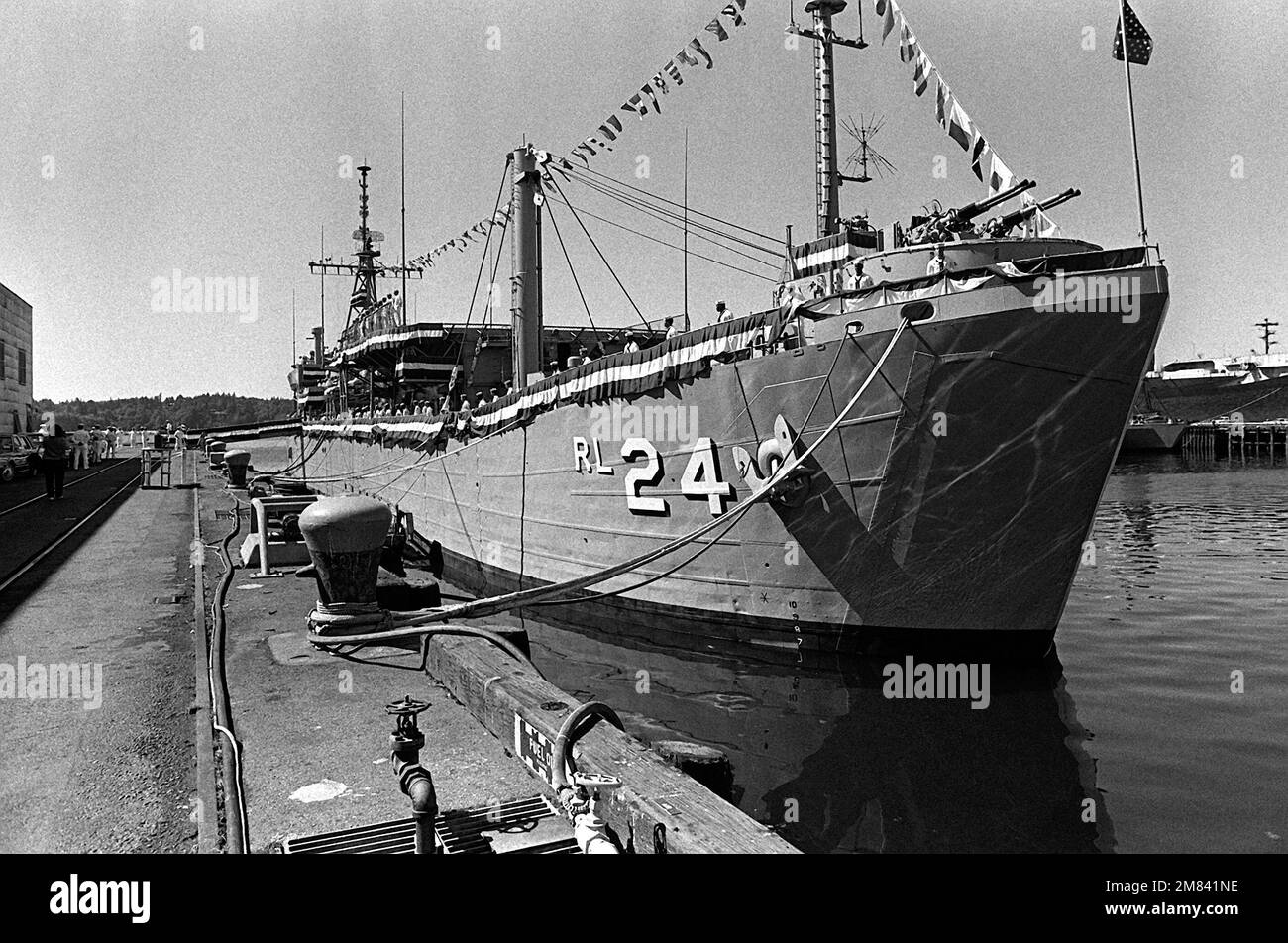 A starboard bow view of the small repair ship USS SPHINX (ARL-24 ...