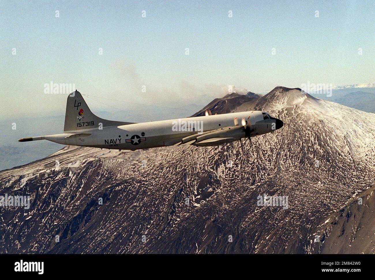 An air-to-air right side view of a P-3 Orion aircraft from Patrol ...