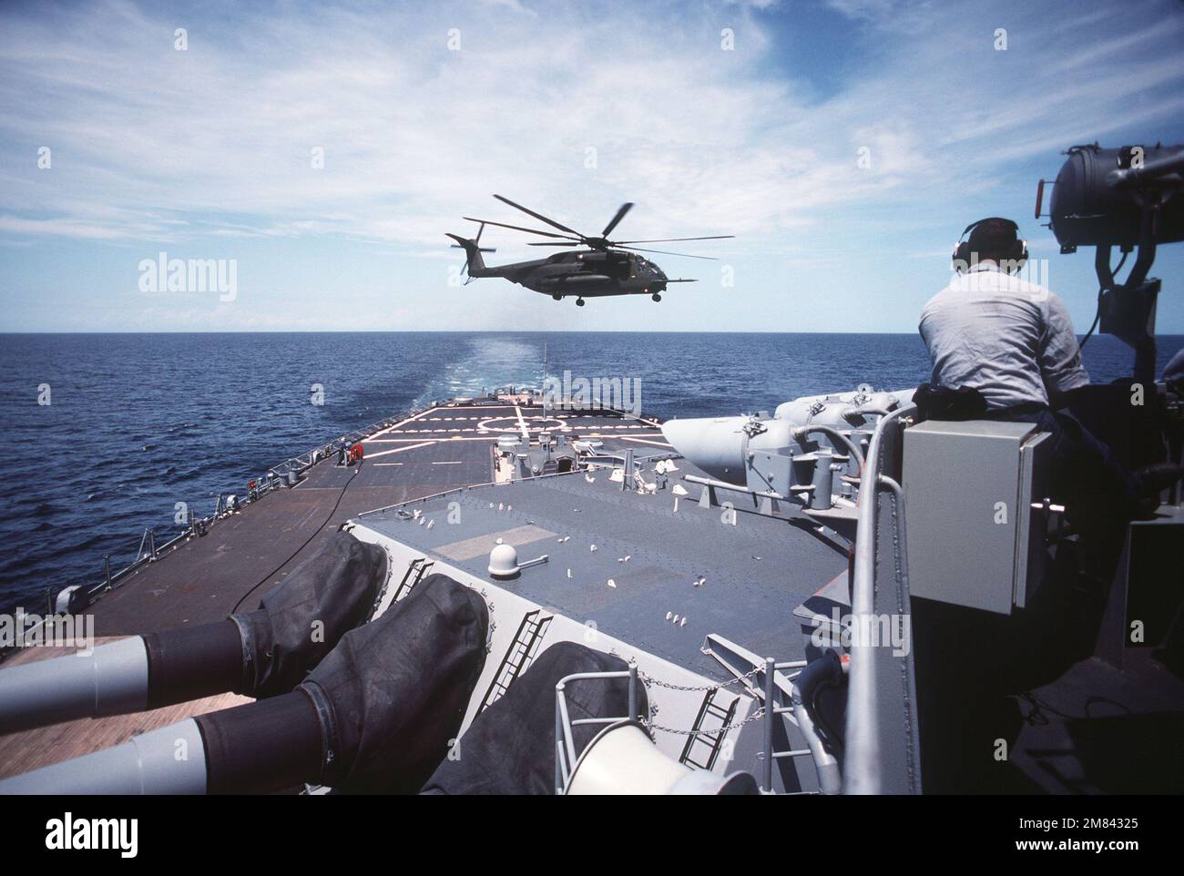 A CH-53E Super Stallion helicopter takes off from the helicopter pad of ...