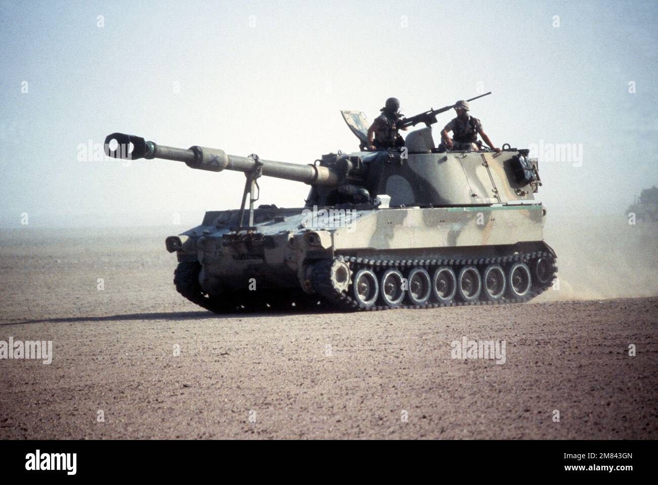 An M-109 155 mm self-propelled howitzer participates in desert ...