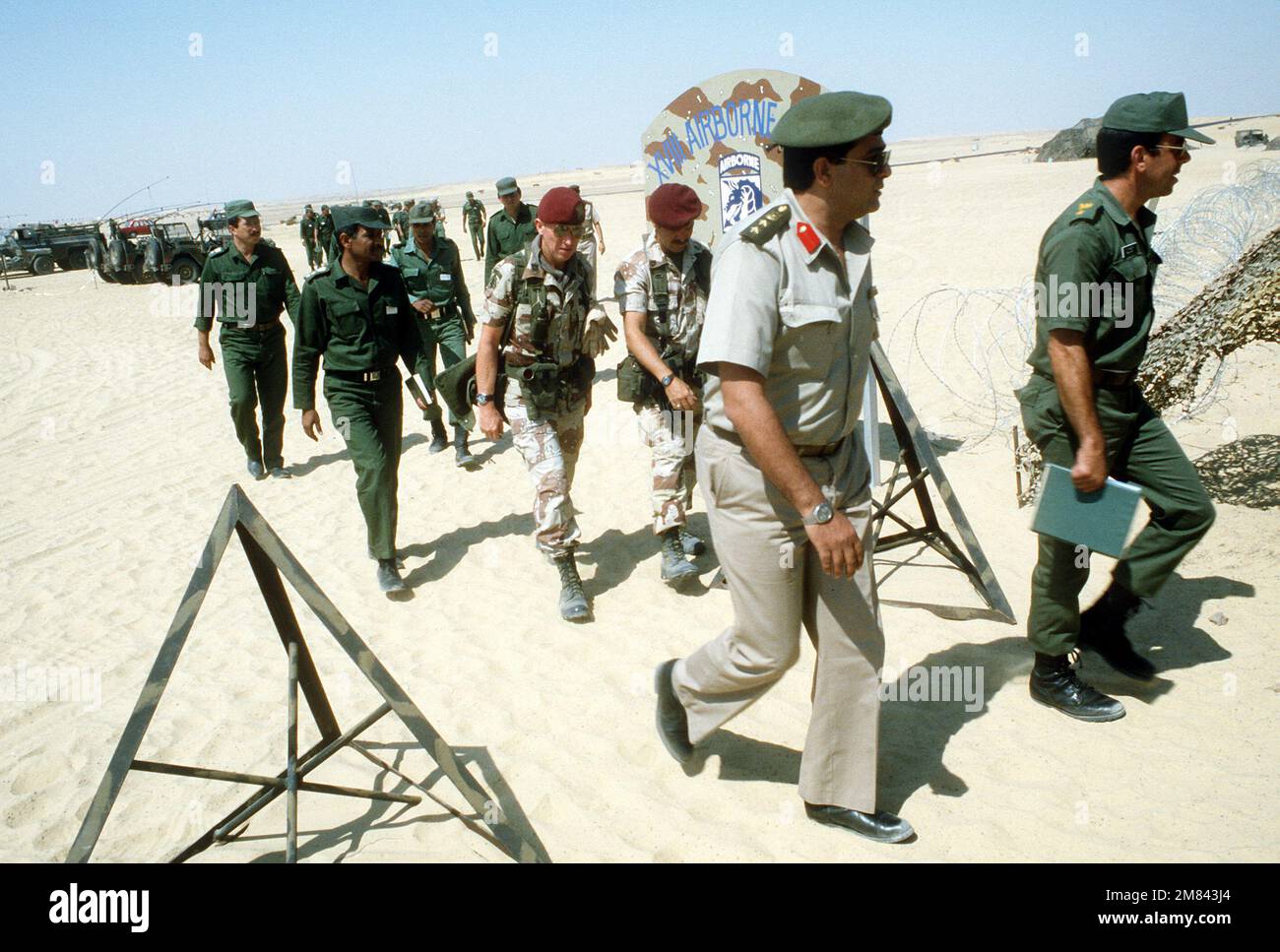 Egyptian military officers are escorted to an electronic warfare ...
