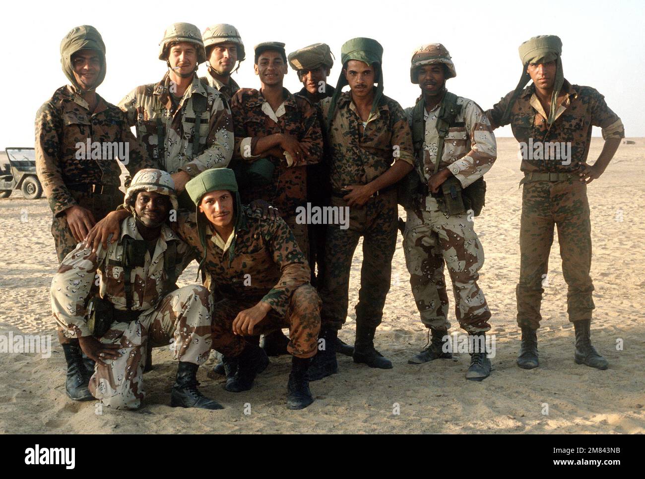 Egyptian and U.S. paratroopers pose for a photograph during the ...