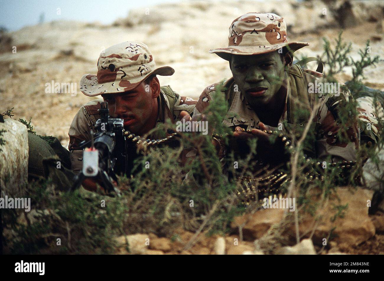 Members of the 101st Airborne Division man an M-60 machine gun during ...