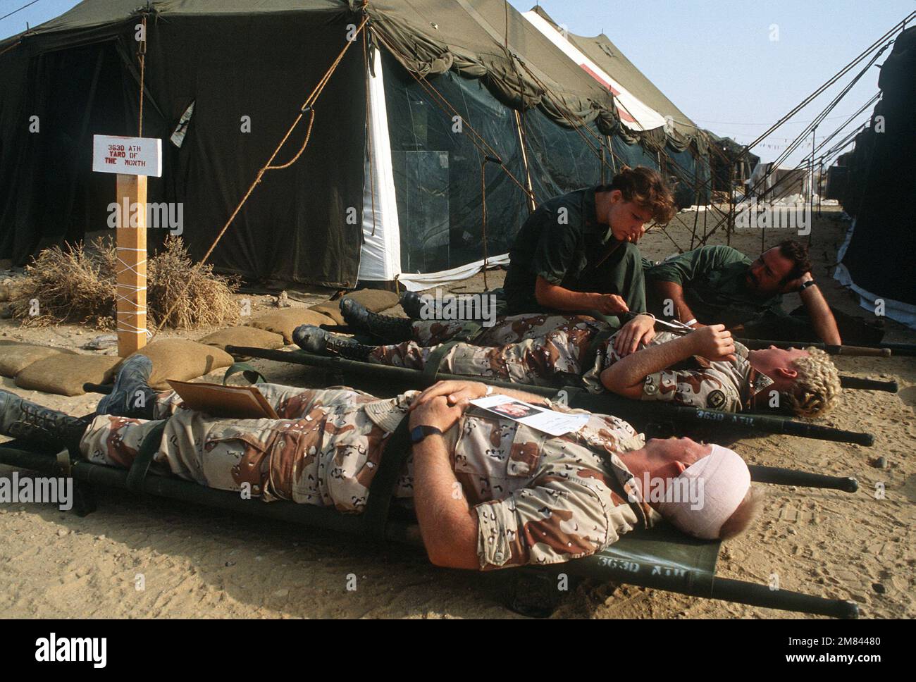 Casualties are examined outside an air transportable hospital as part ...