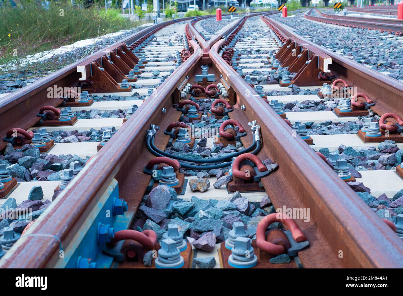 picture of converging railroad tracks Stock Photo - Alamy
