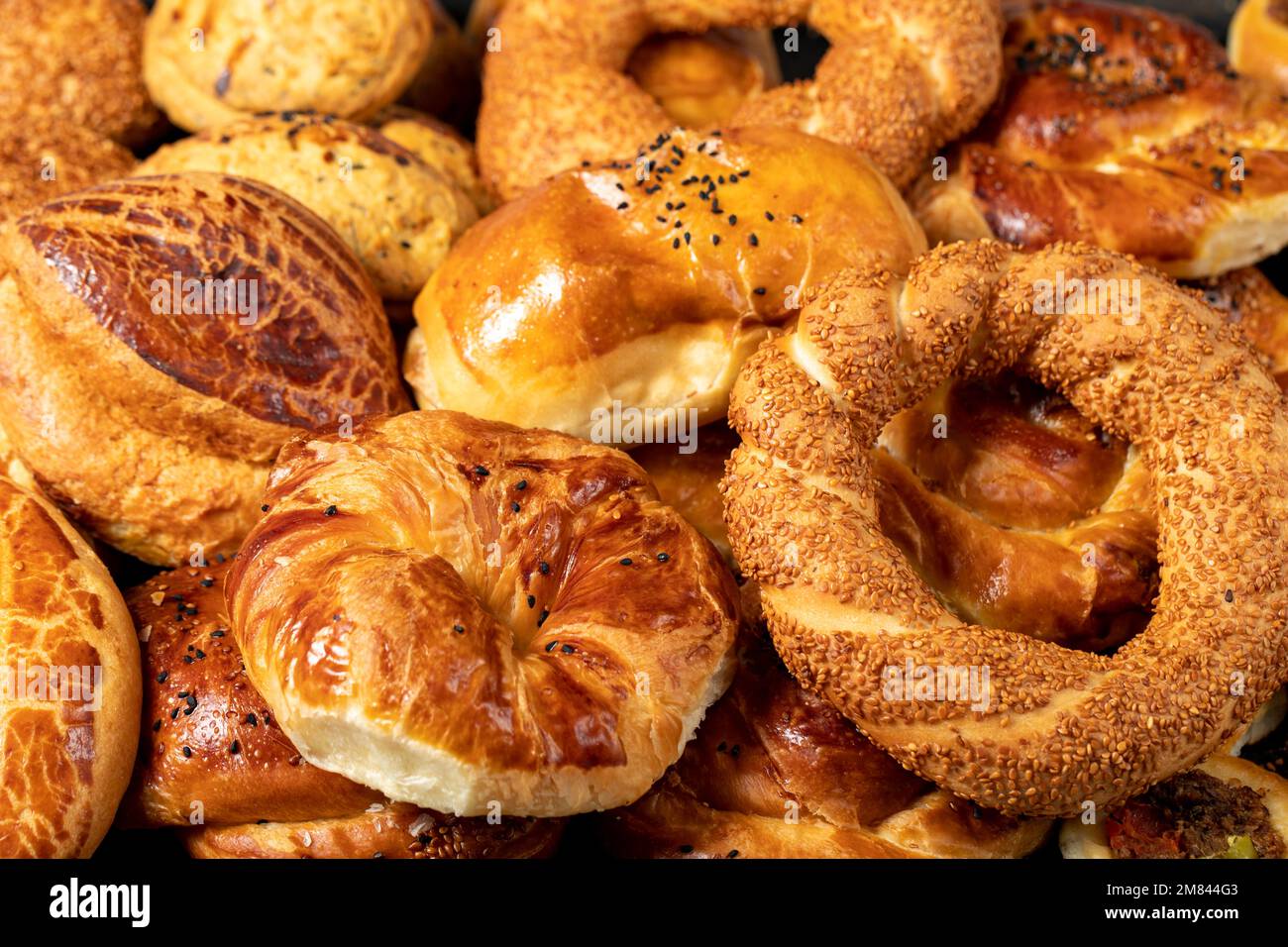 Bagel and pogaca varieties. They eat pastries in piles. Bakery products ...